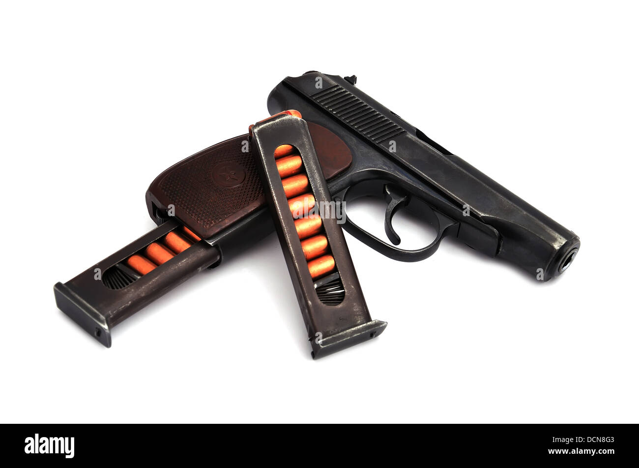 steel pistol and magazines Stock Photo - Alamy