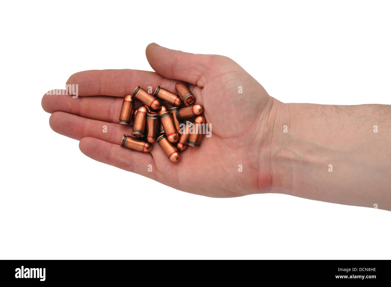 Bullets in hand hi-res stock photography and images - Alamy