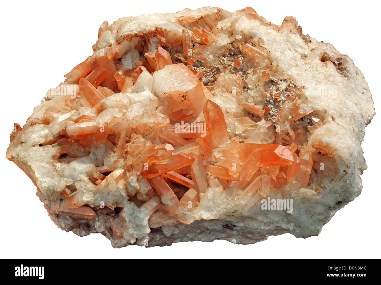 A piece of orange rock crystal isolated on white background Stock Photo ...