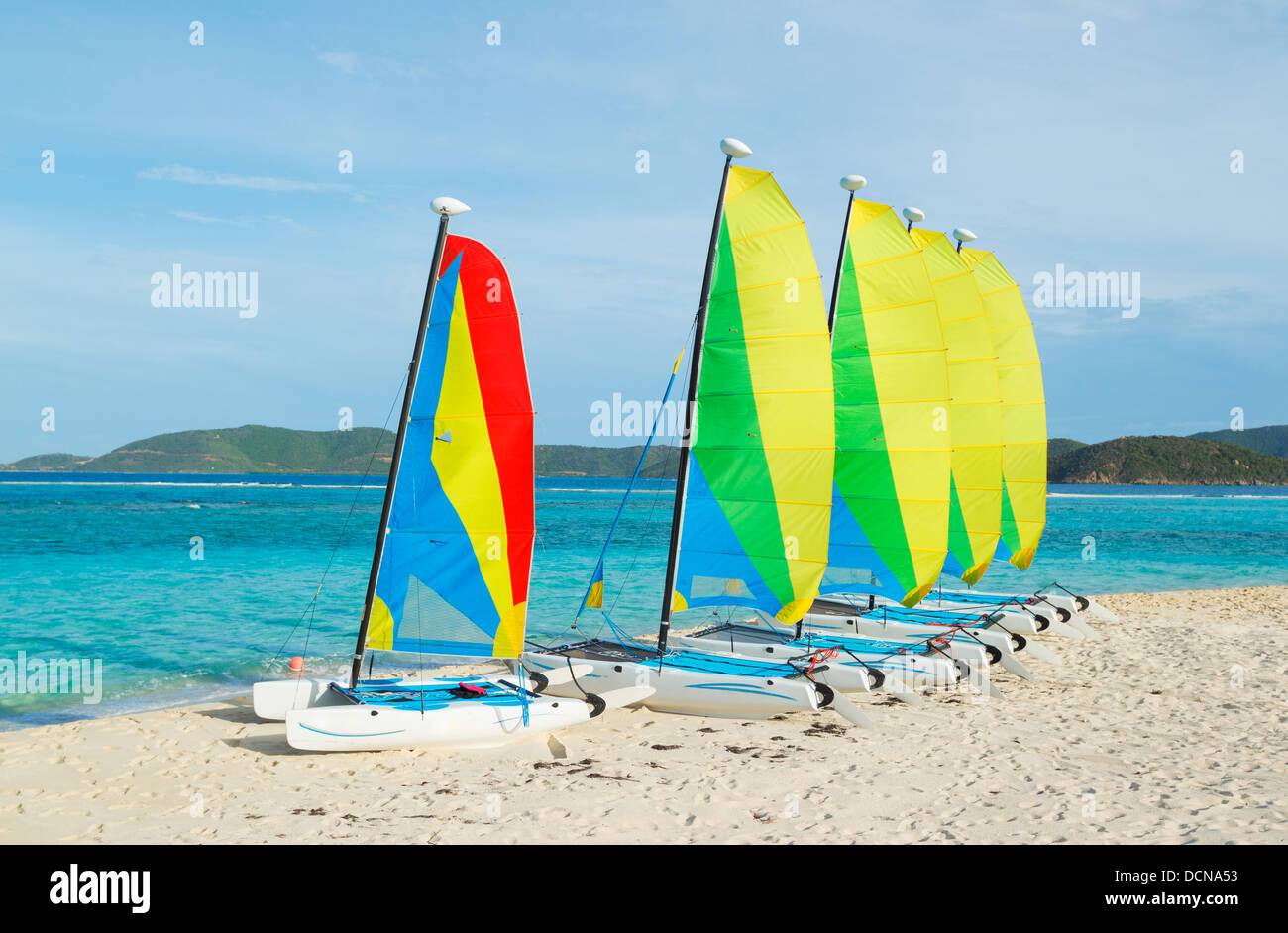 Sail Boats with colorful sails on tropical beach, Catamarans Stock ...