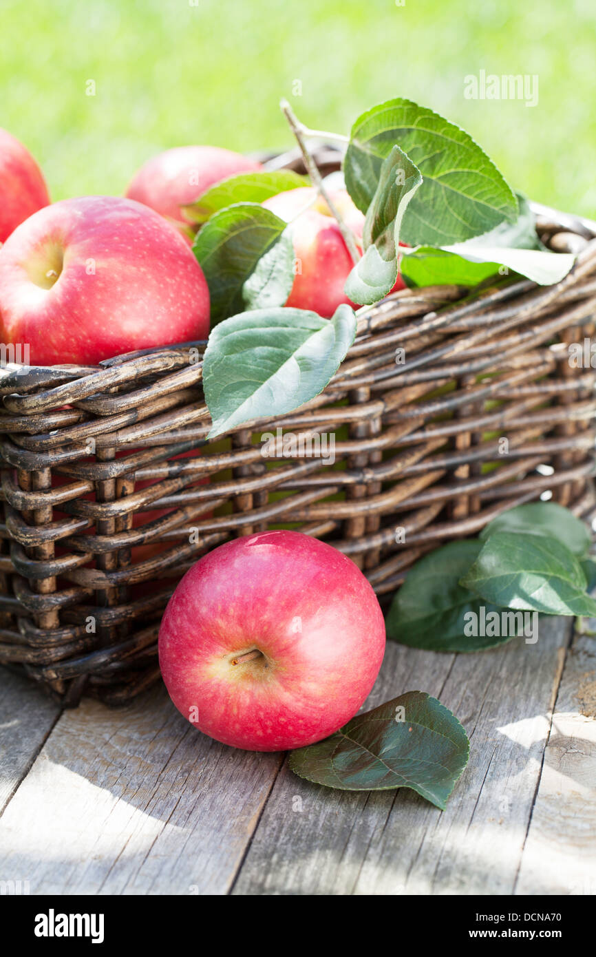 Fresh ripe red apples in basket Stock Photo - Alamy