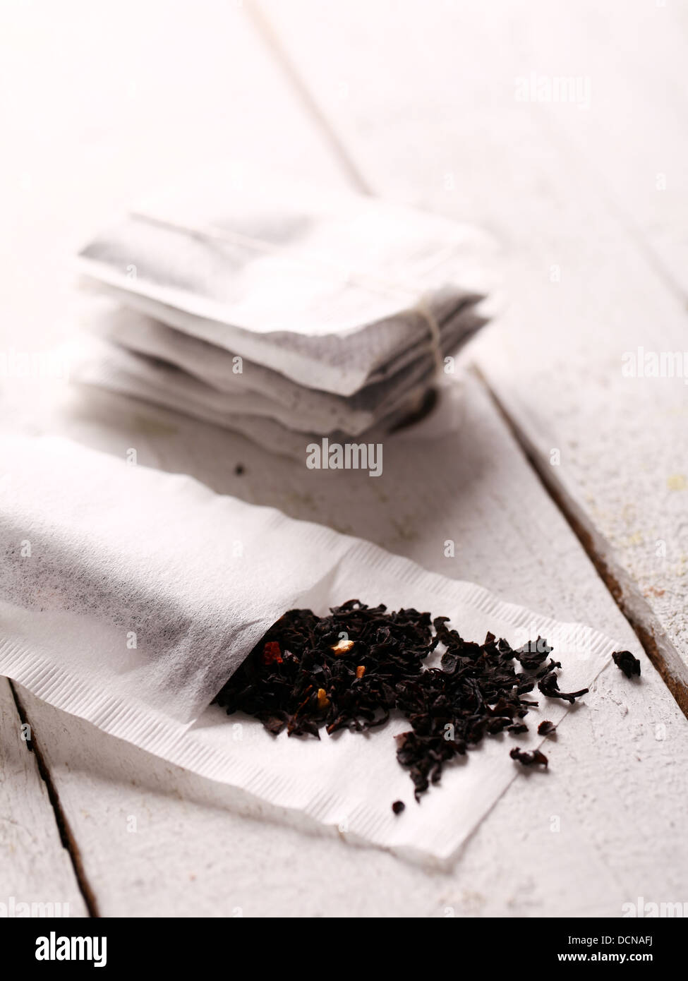 Opened teabag on a surface Stock Photo - Alamy