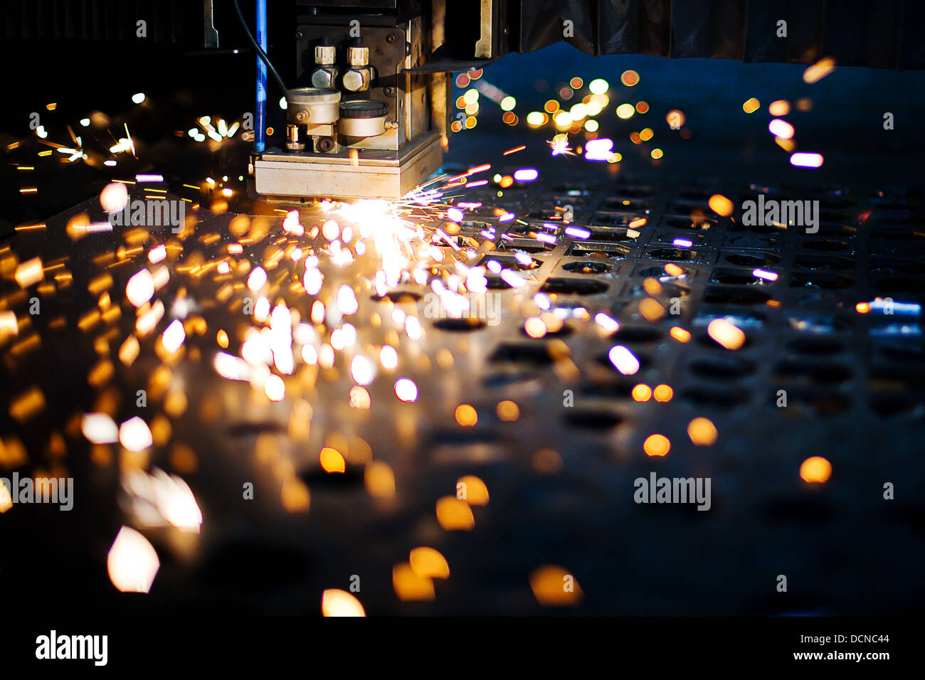 Laser cutting machine processing dark hi-res stock photography and ...