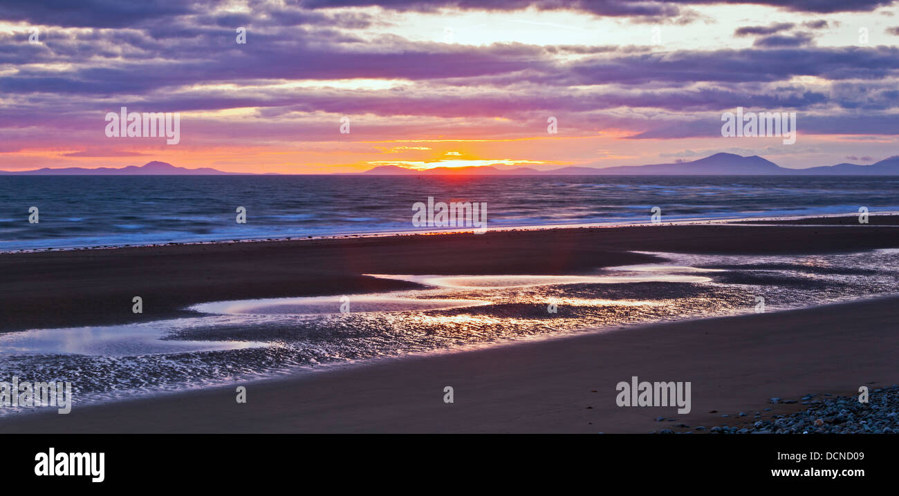 Sunset over the Irish Sea at Fairbourne in Snowdonia North Wales Stock ...