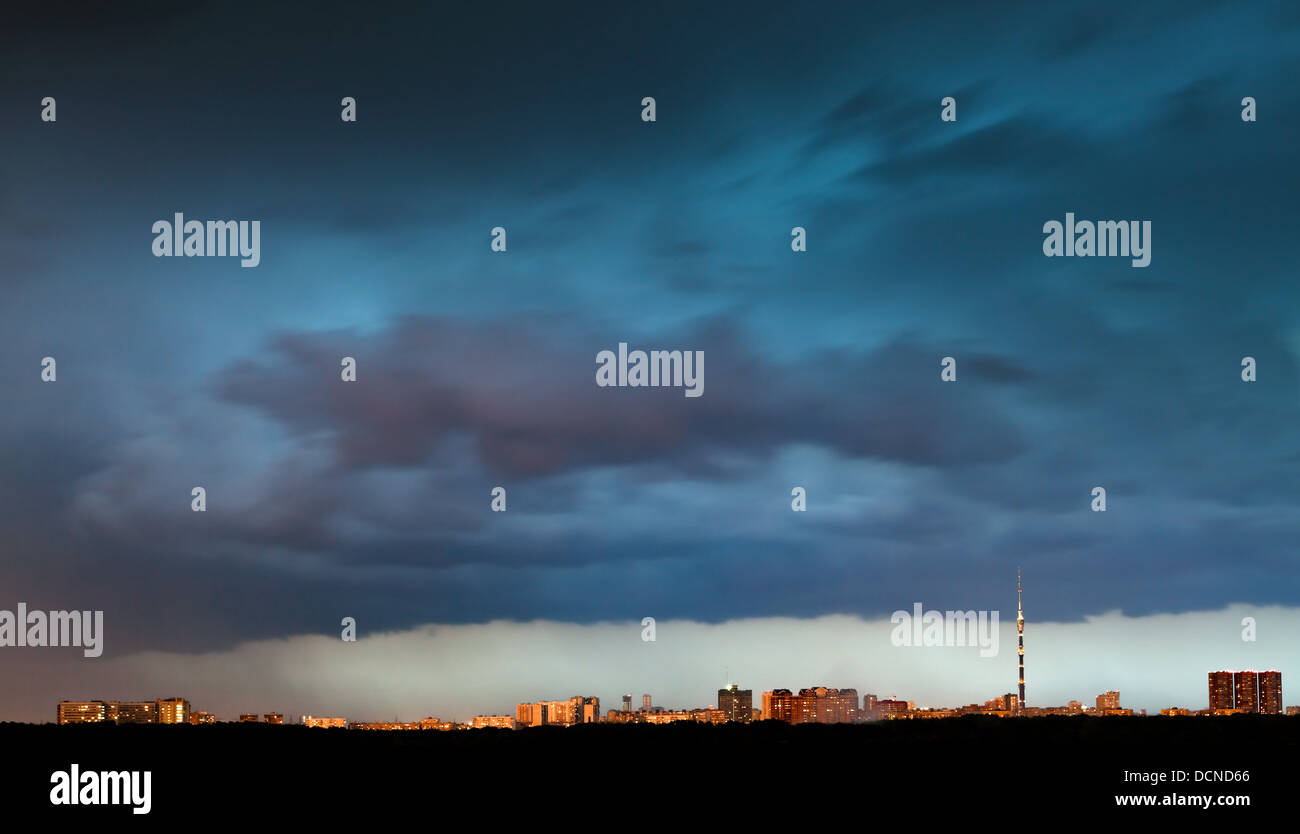 Weather sky storm clouds rain city skyline sunset hi-res stock ...