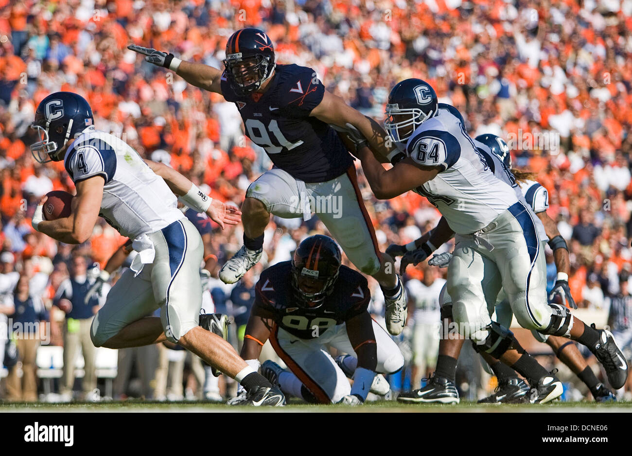 Virginia defensive end Chris Long (91) puts pressure on Connecticut ...