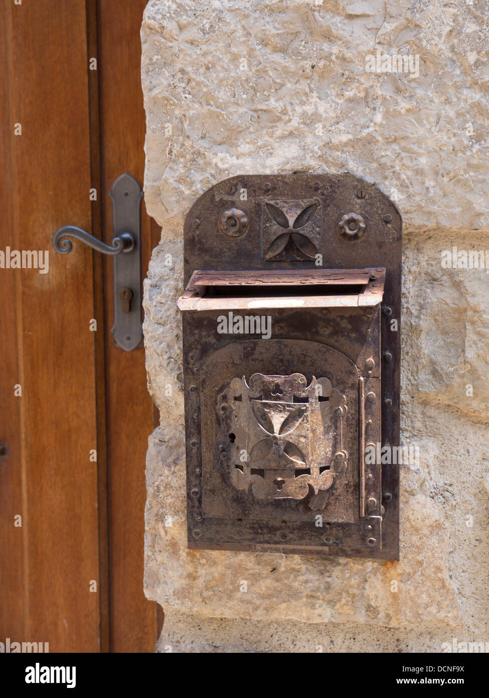 an old iron post or letter box in the mediaeval town of Lagrasse, Aude ...