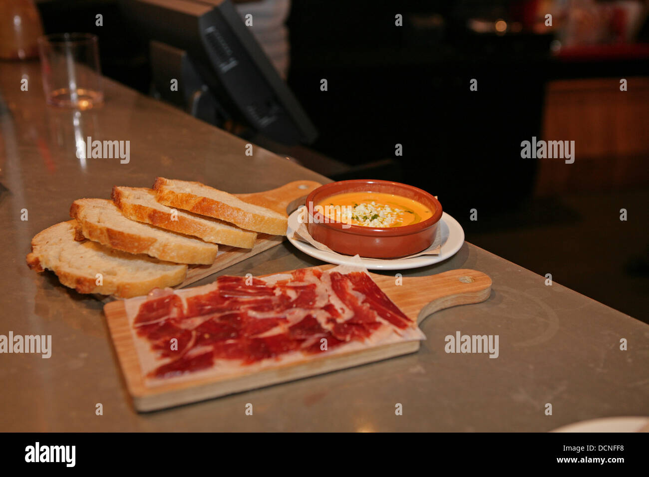 Greenhithe, UK, 20th August 2013, Tapas dishes of cured bacon with a ...