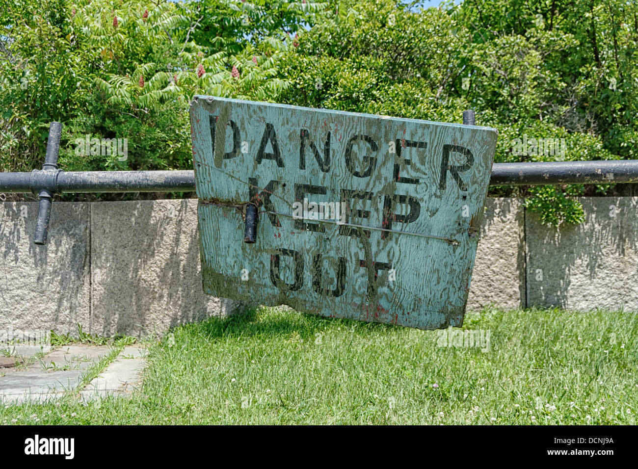 The weather-beaten sign reads Danger Keep Out near entrance to the ...