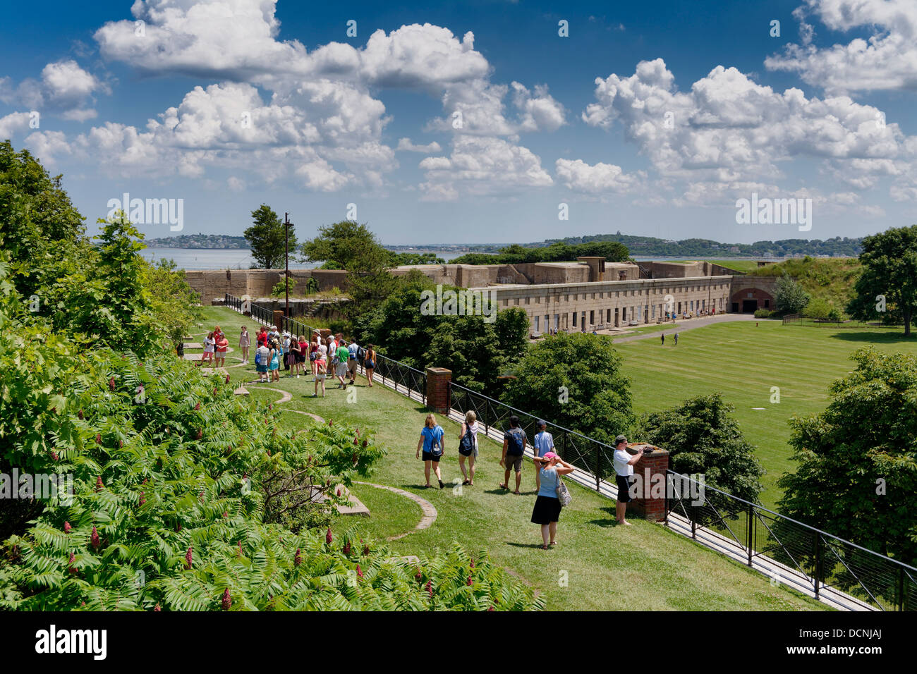 Park visitors walk along the line of abandoned gun emplacements above ...