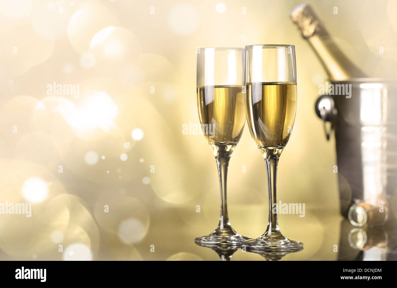 Flutes of champagne in holiday setting Stock Photo - Alamy