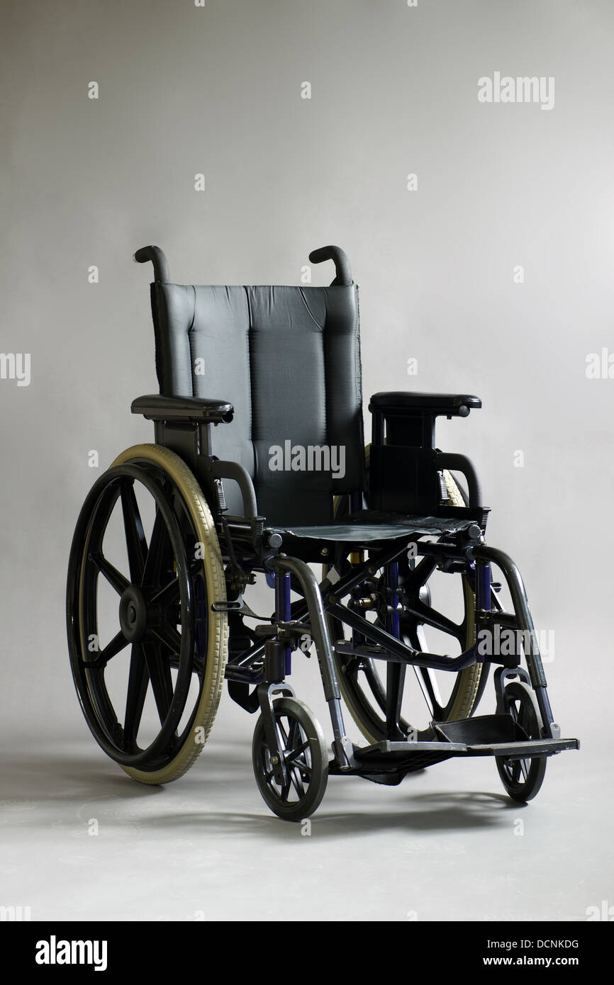 Wheelchair over grey background Stock Photo - Alamy