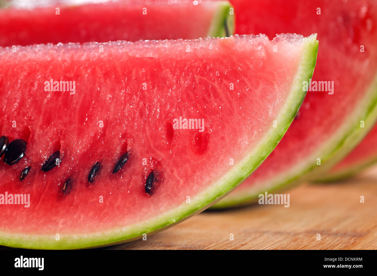 fresh watermelon on a wood table Stock Photo - Alamy
