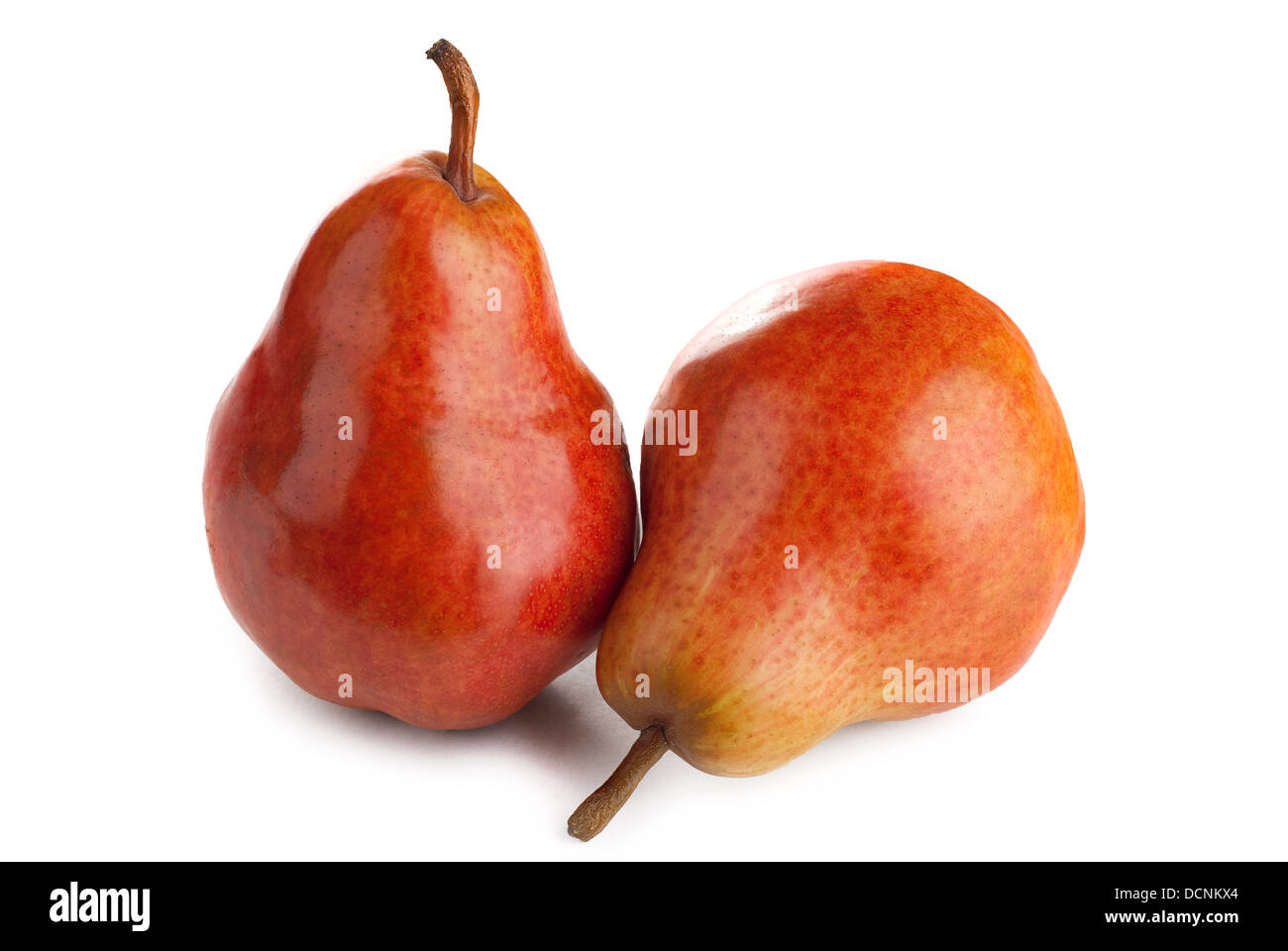 Two pears on a white background Stock Photo - Alamy