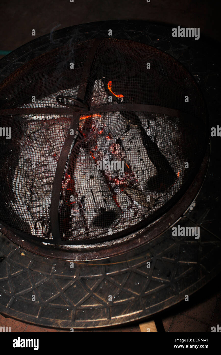 Outdoor fire pit at night Stock Photo - Alamy