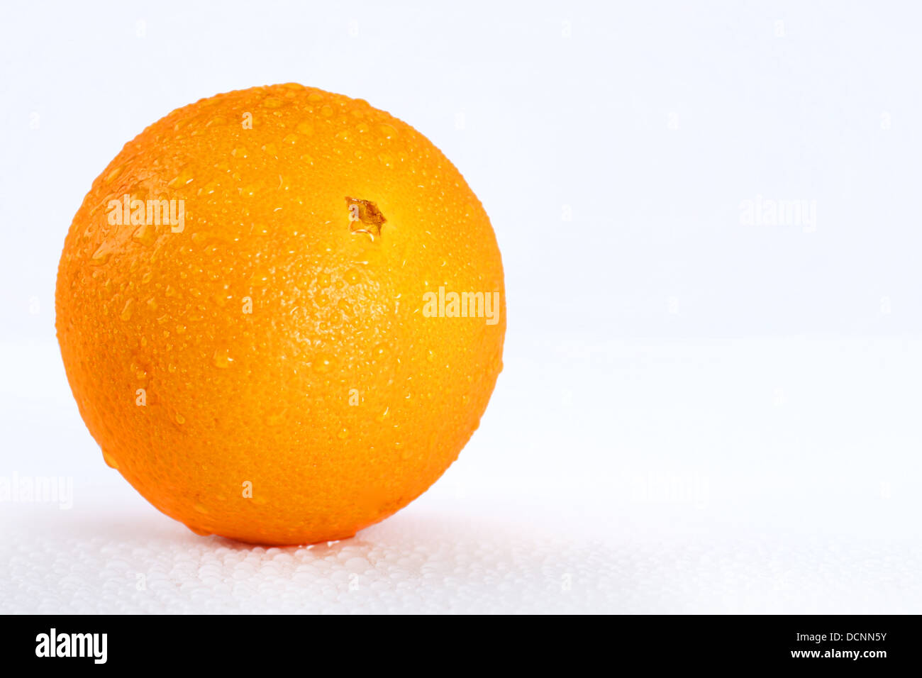 Delicious wet orange over white Stock Photo - Alamy