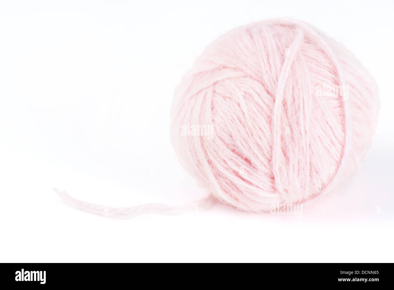 Ball of pretty soft pale pink angora wool Stock Photo - Alamy