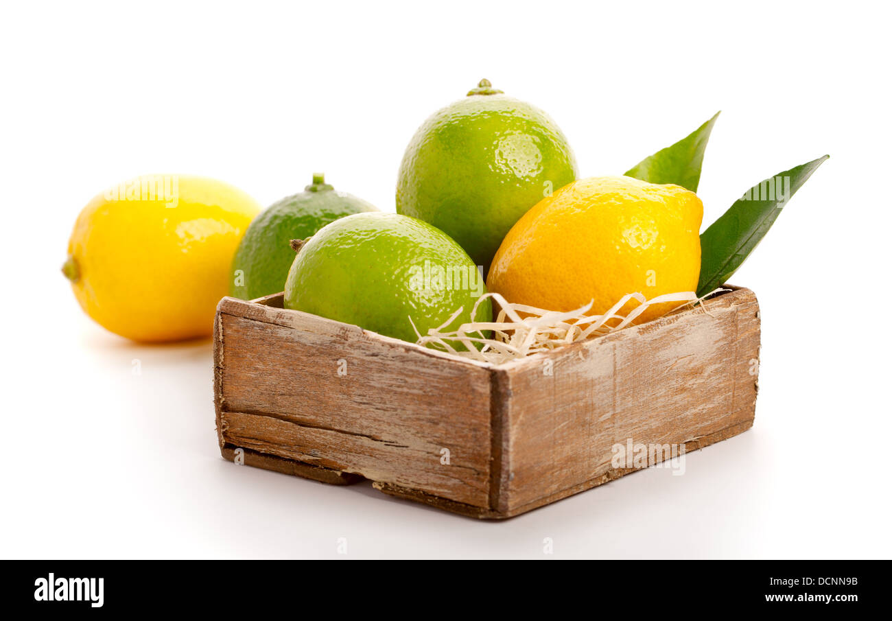 yellow and green lemon over white background Stock Photo - Alamy