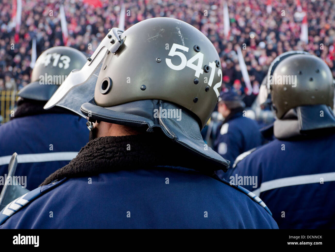 Stadium police crowd Stock Photo - Alamy