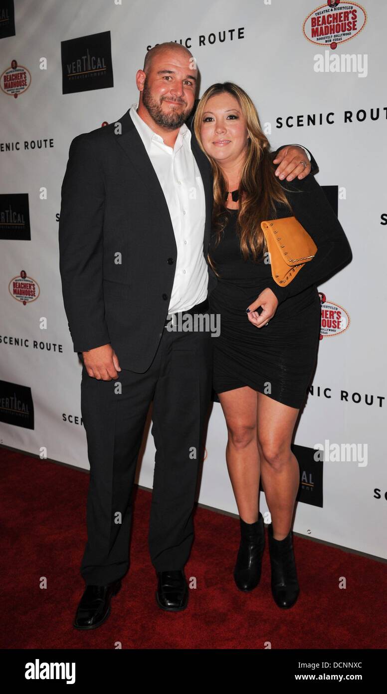 Los Angeles, CA. 20th Aug, 2013. Michael Goetz, wife Tracyt at arrivals ...