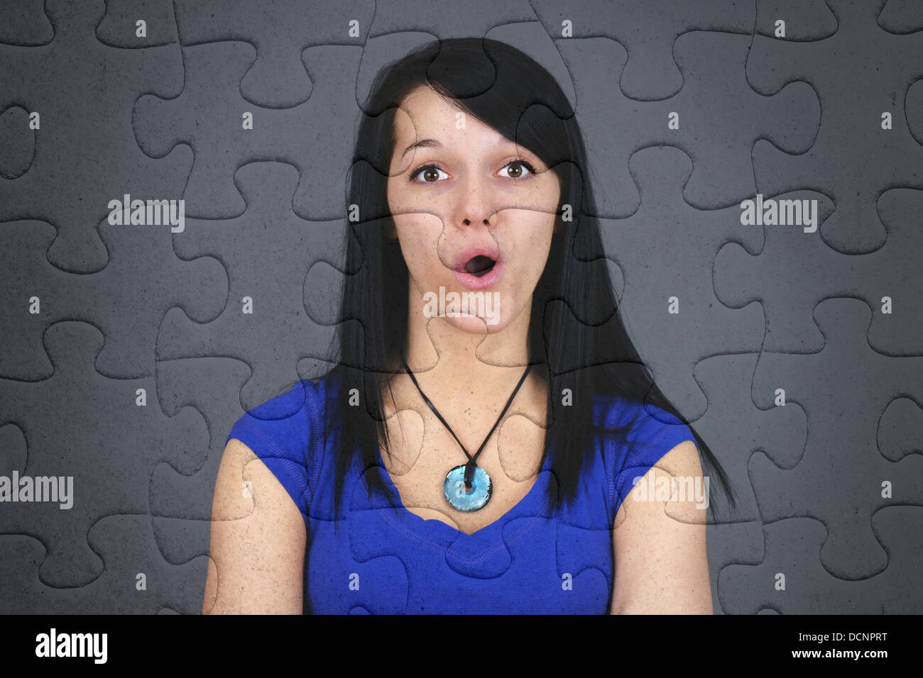 Puzzled young woman Stock Photo - Alamy