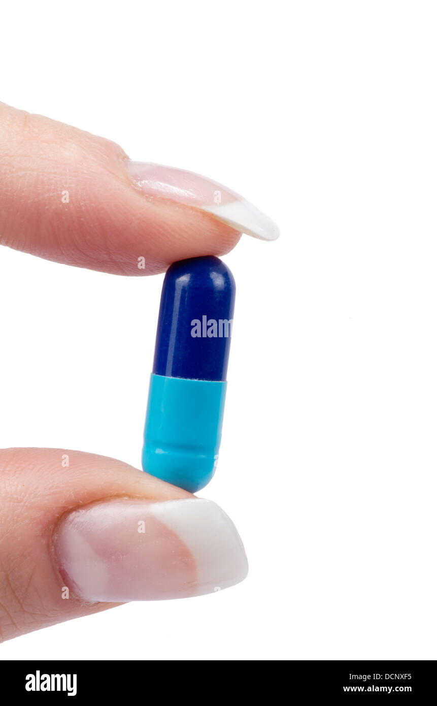 hand holds pill Stock Photo - Alamy