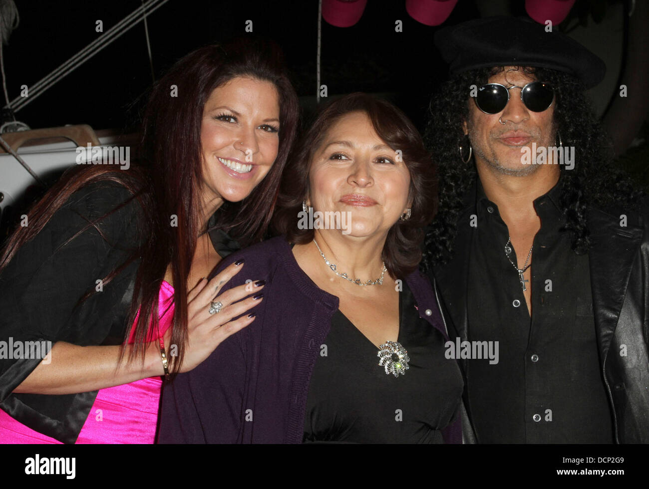 Slash and Perla Hudson with their Survivor Nanny The Designs For the ...