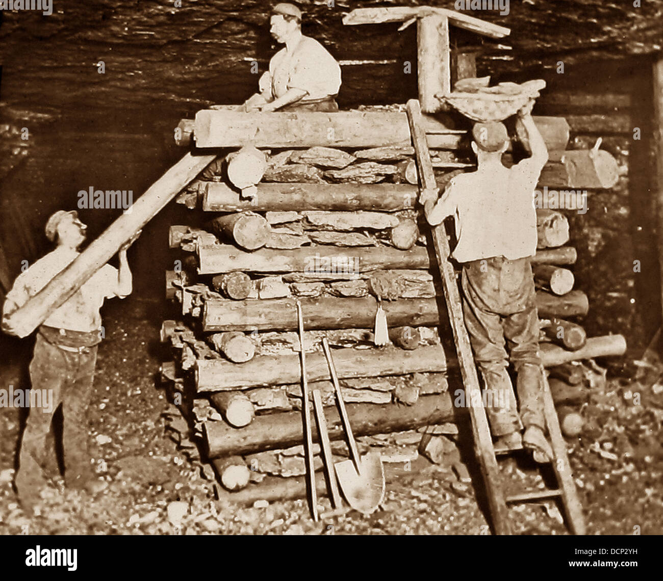 Miners building a cog Victorian period Stock Photo - Alamy