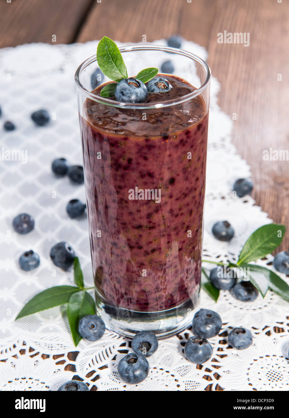 Blueberry juice with fresh fruits on wood Stock Photo - Alamy