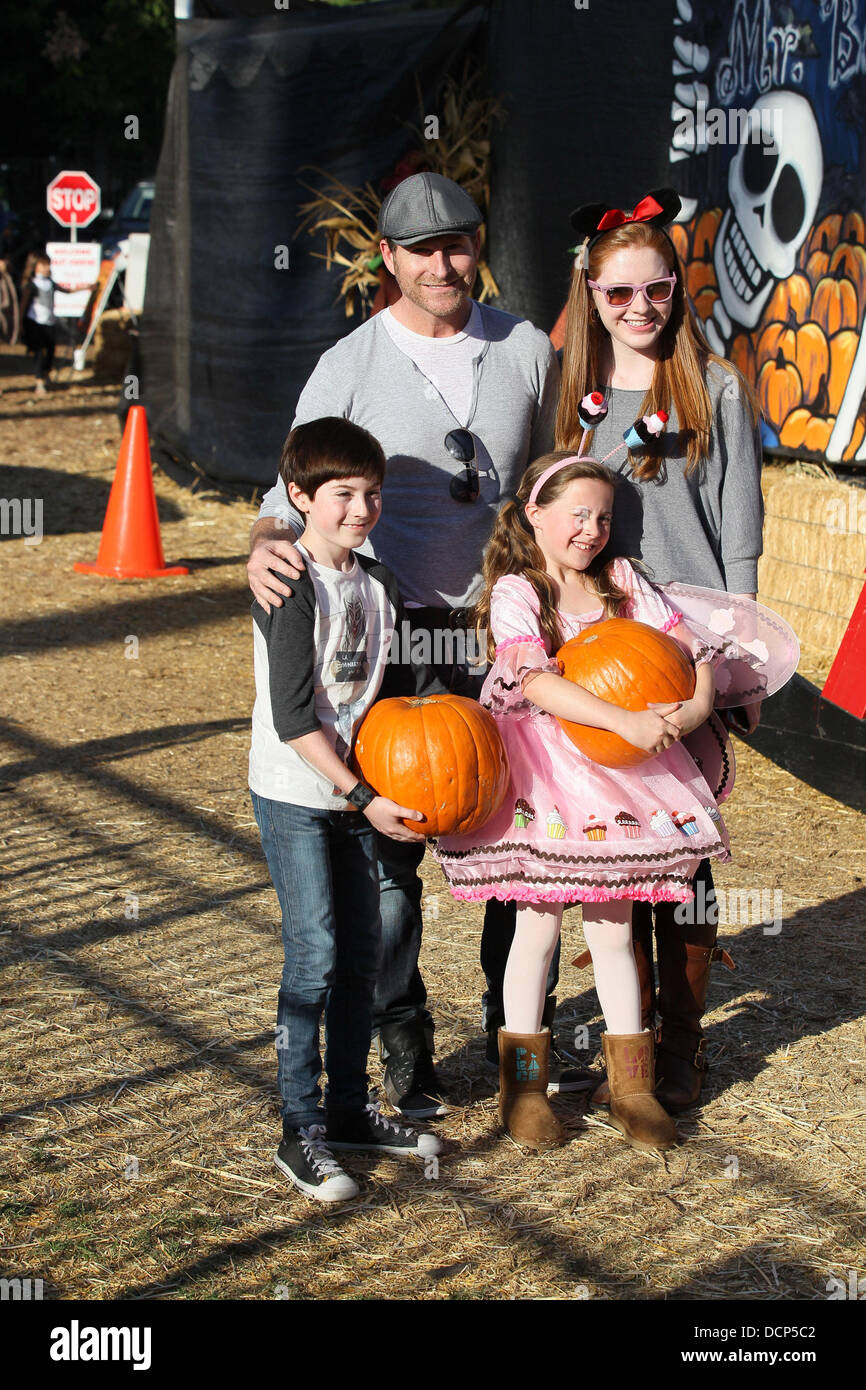 Spy Kids star Mason Cook with his father and his sisters Georgia and ...