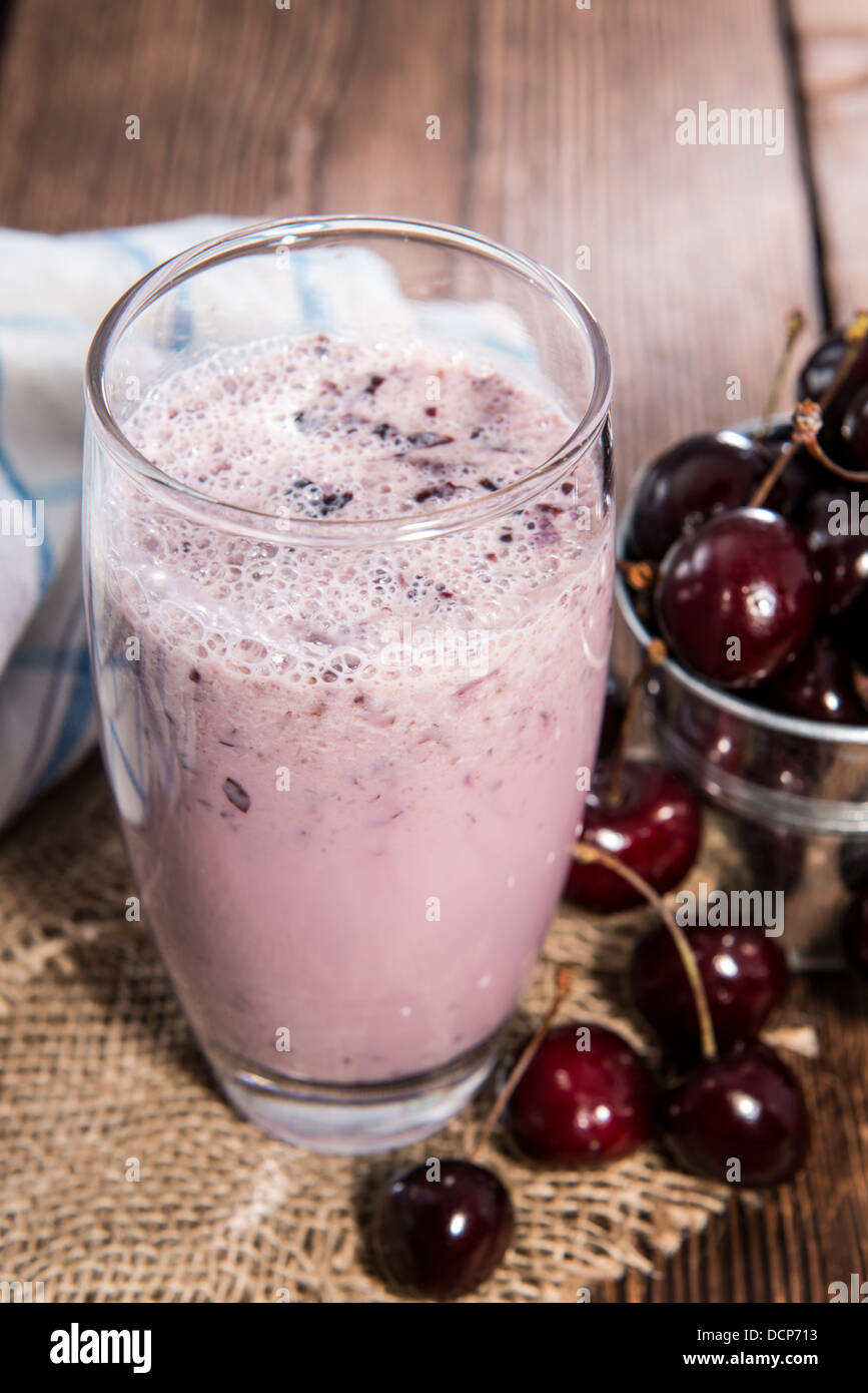 Cherry Milkshake with fresh fruits Stock Photo - Alamy