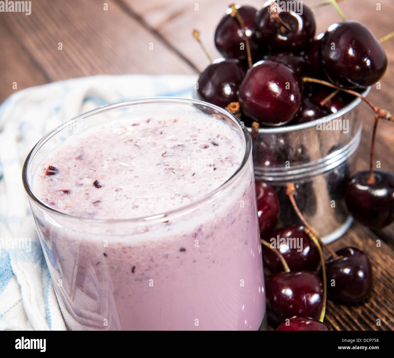 Cherry Milkshake with fresh fruits Stock Photo - Alamy