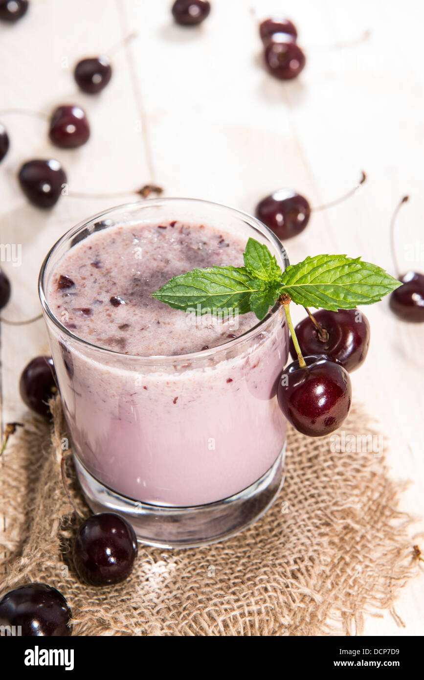 Cherry Milkshake with fresh fruits Stock Photo - Alamy