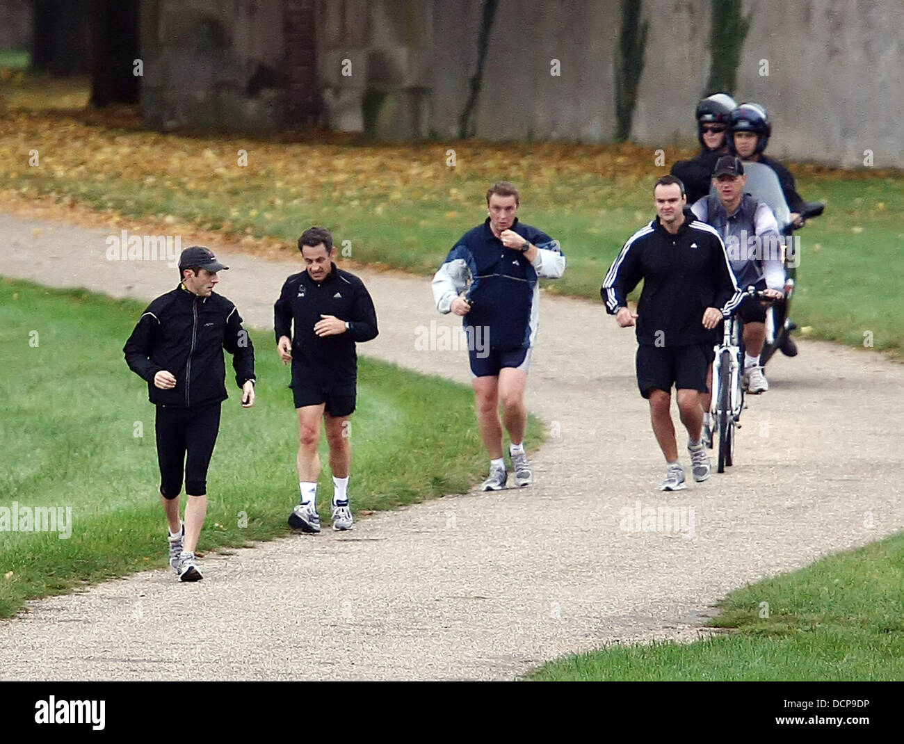 French President Nicolas Sarkozy out jogging in Versaille with friends ...