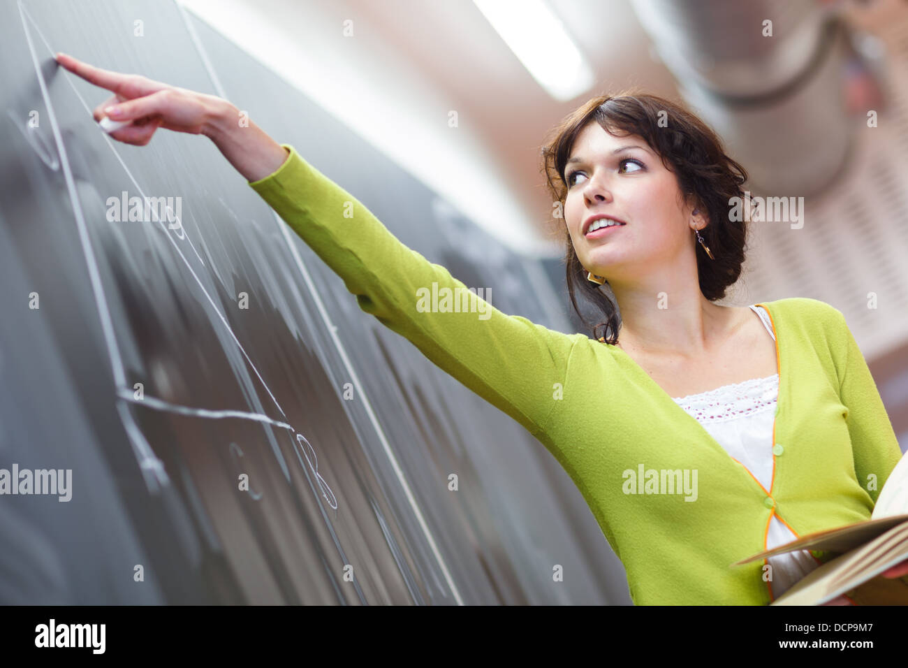Pretty young college teacher Stock Photo - Alamy