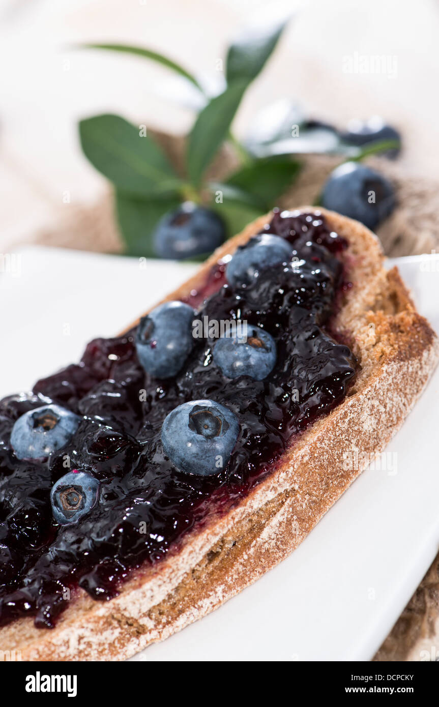 Slice of Bread with Blueberry Jam and fresh fruits Stock Photo - Alamy