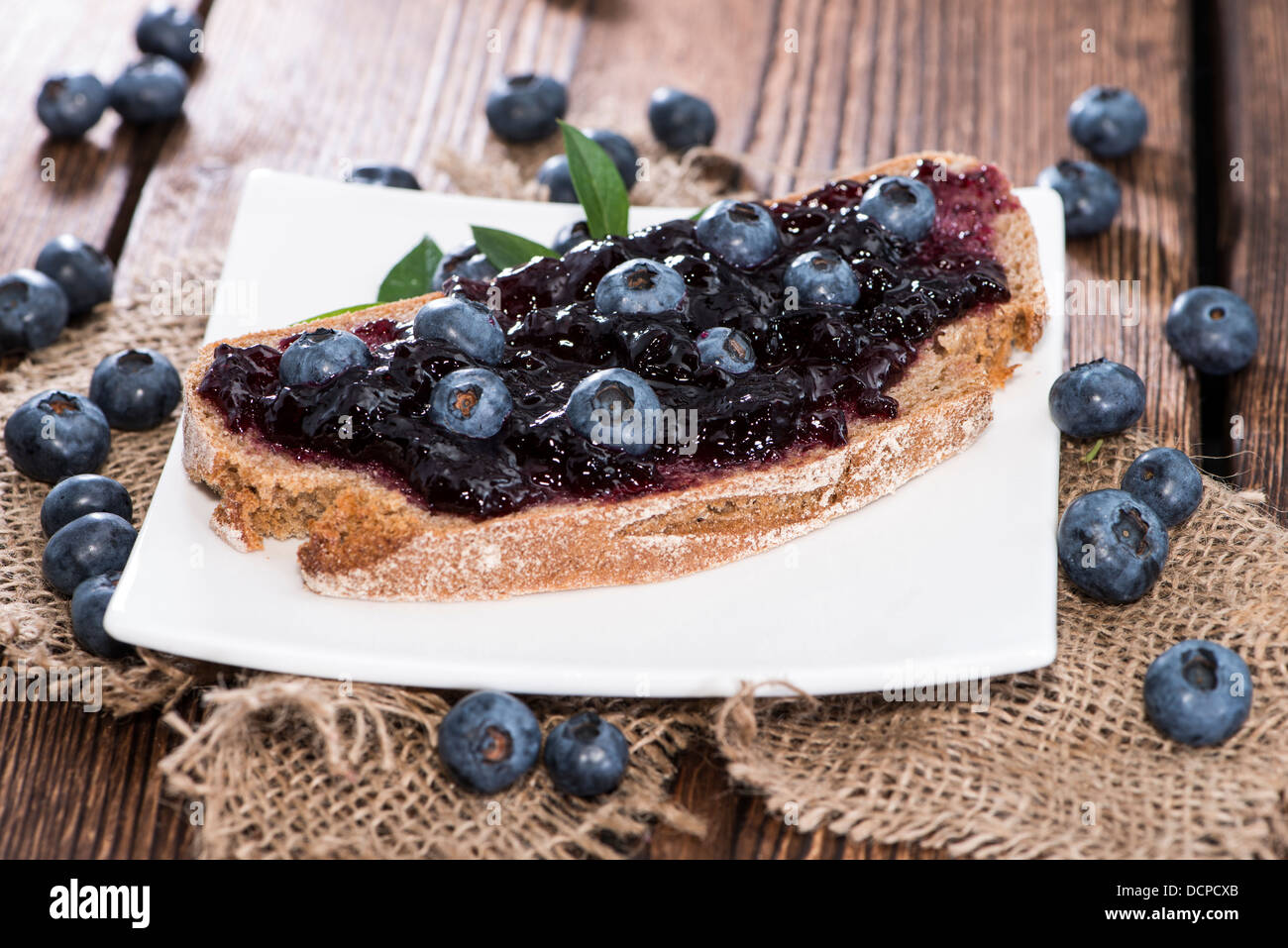 Fresh made Blueberry Jam on a slice of bread Stock Photo - Alamy