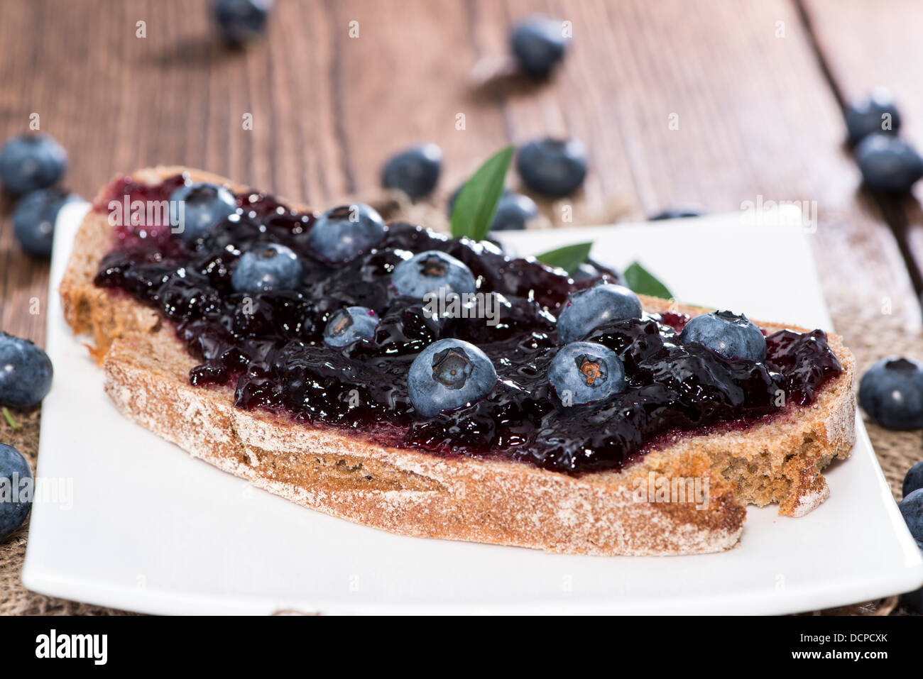 Slice of Bread with fresh made Blueberry Jam Stock Photo - Alamy