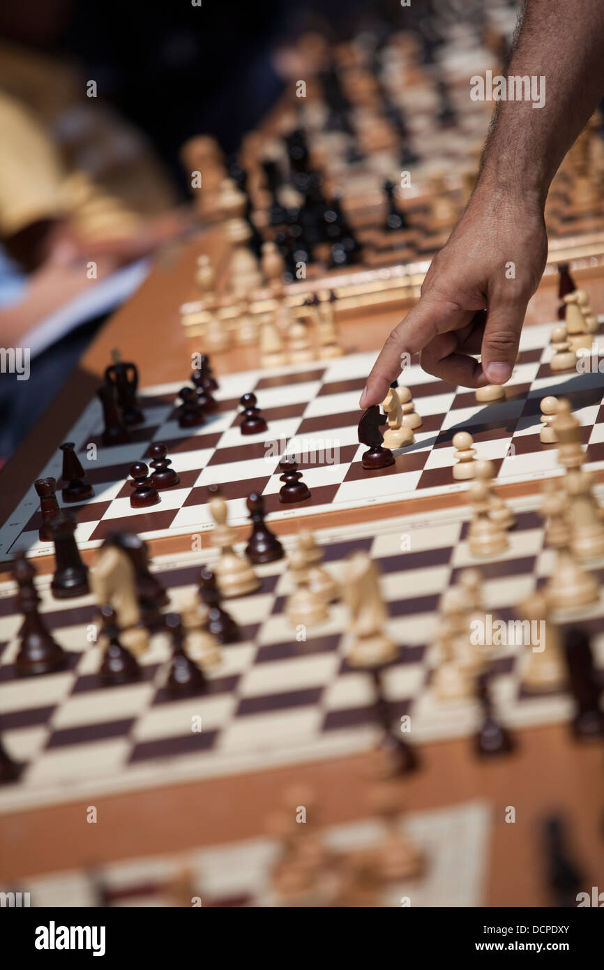 Hand moves chess pieces hi-res stock photography and images - Alamy