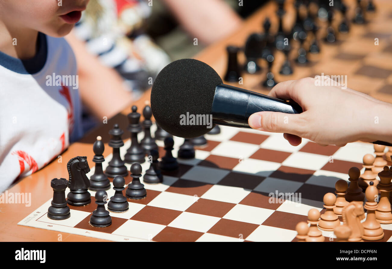 interview with boy playing a chess Stock Photo - Alamy