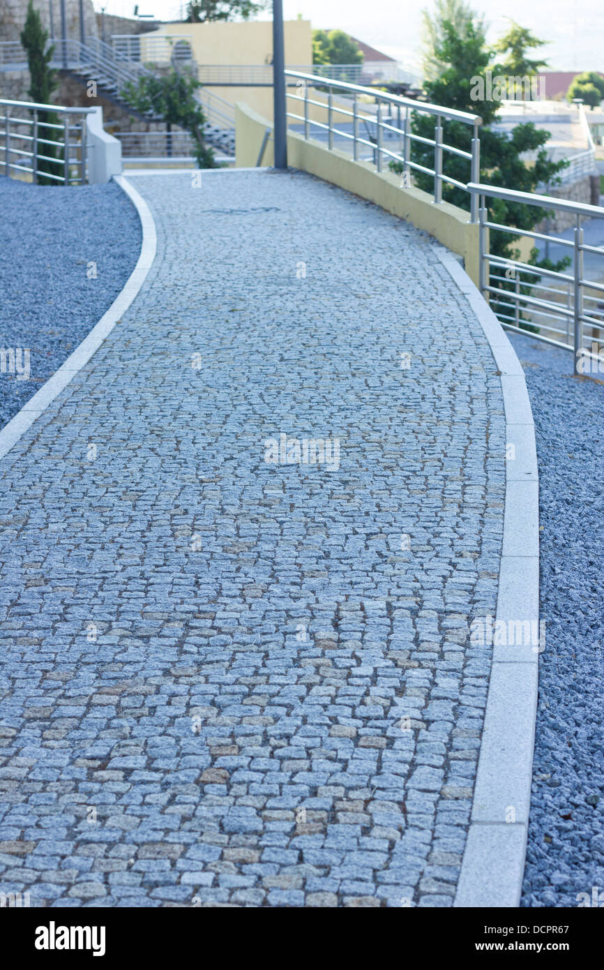 Cobblestone path made with marble in a garden Stock Photo - Alamy