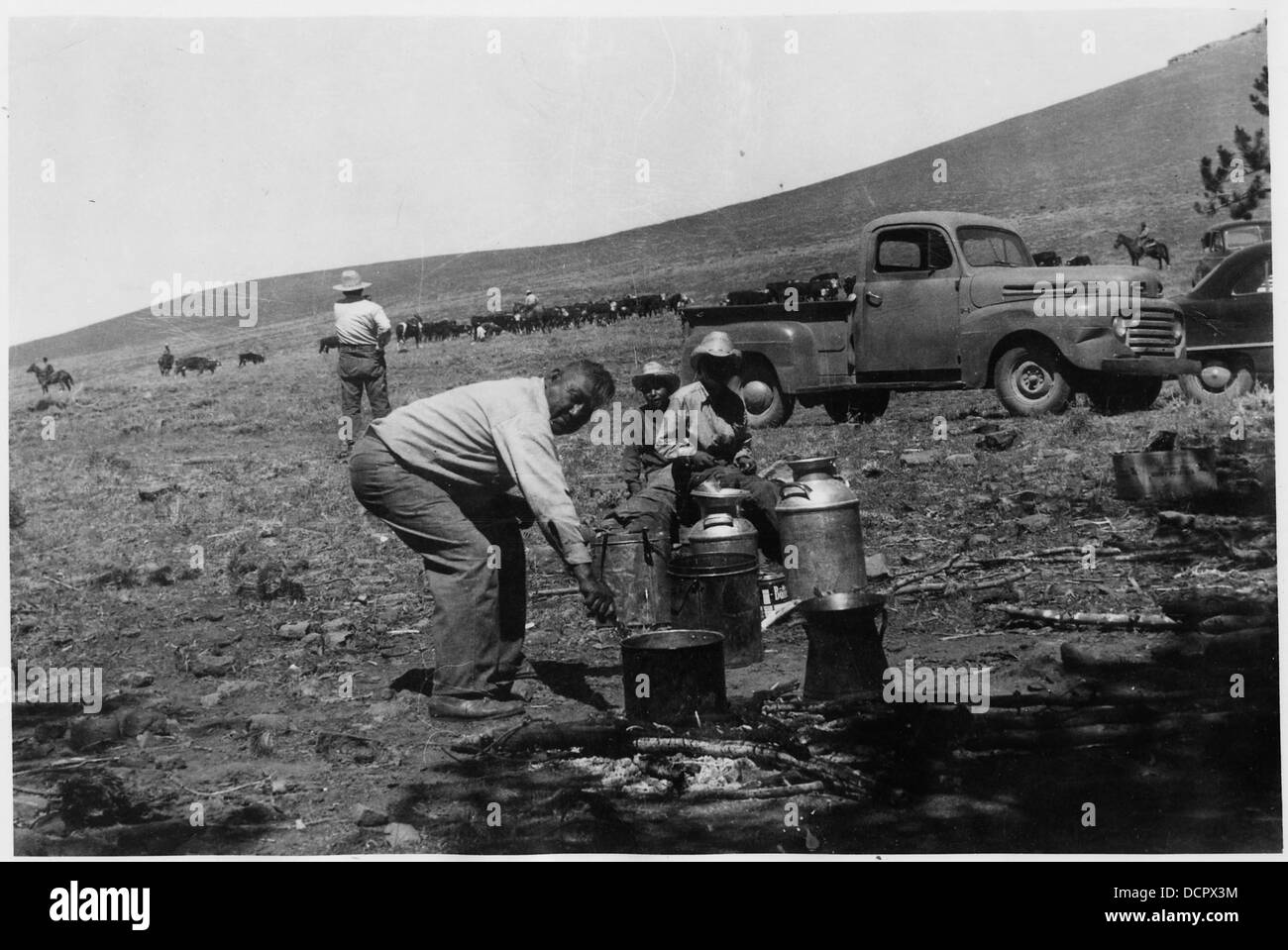 A historical photograph of a camp on the cattle range at the Wind River ...