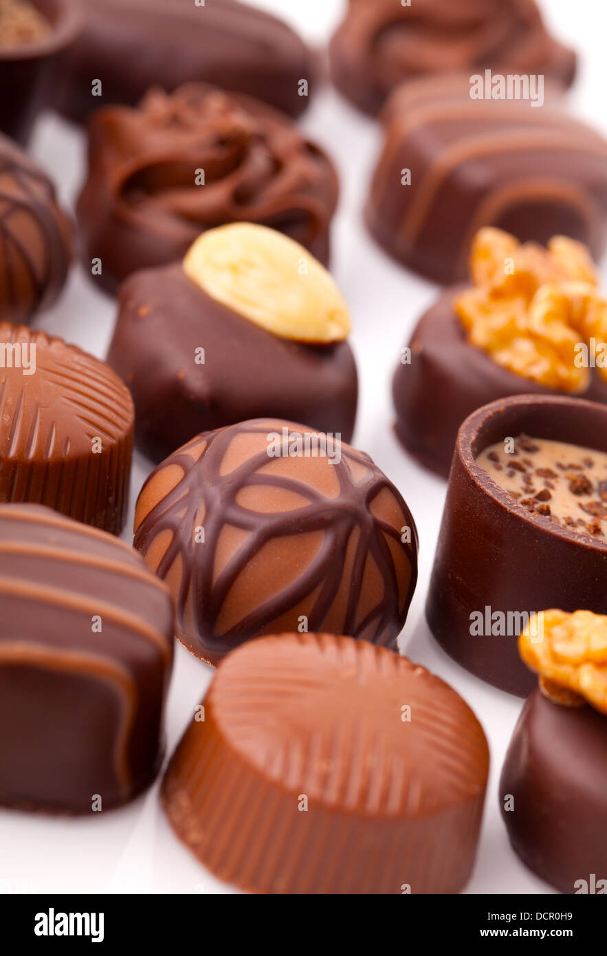 Delicious Chocolate Pralines , On White Background Stock Photo - Alamy