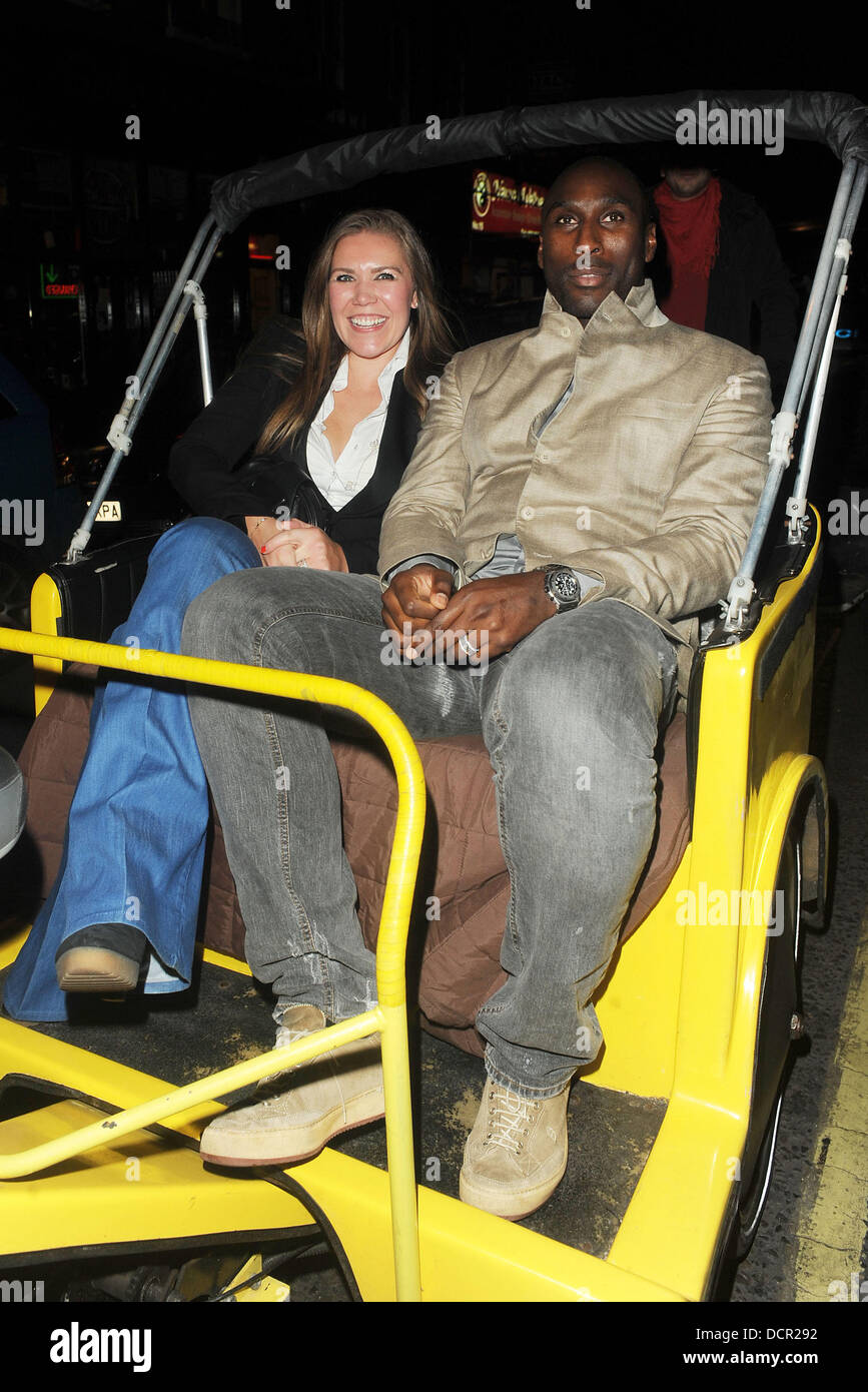 Sol Campbell and his wife Fiona Barrett leaving Box Club London ...