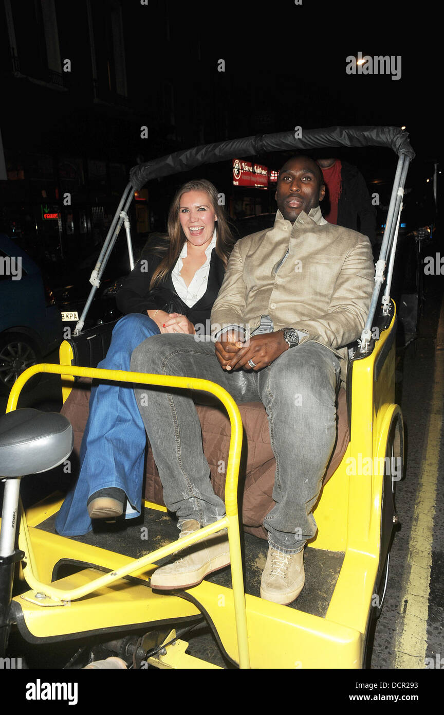 Sol Campbell and his wife Fiona Barrett leaving Box Club London ...