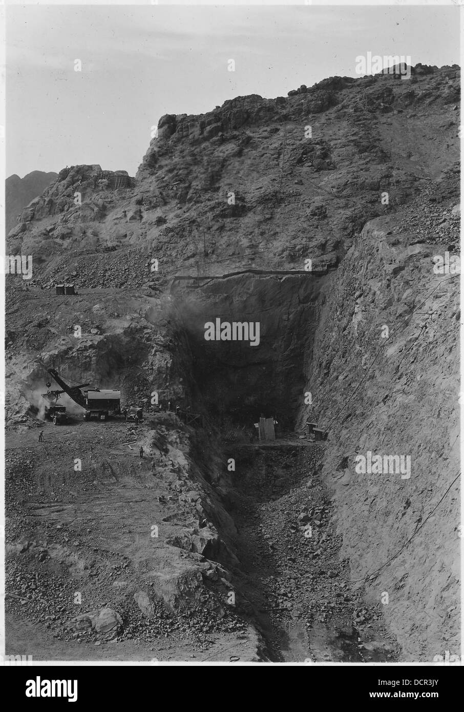 The excavation for the Nevada spillway is visible, with a marked ...