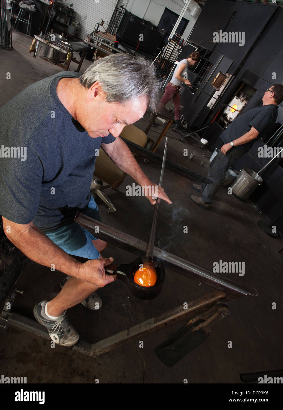 Busy Workers Making Glass Art Stock Photo - Alamy