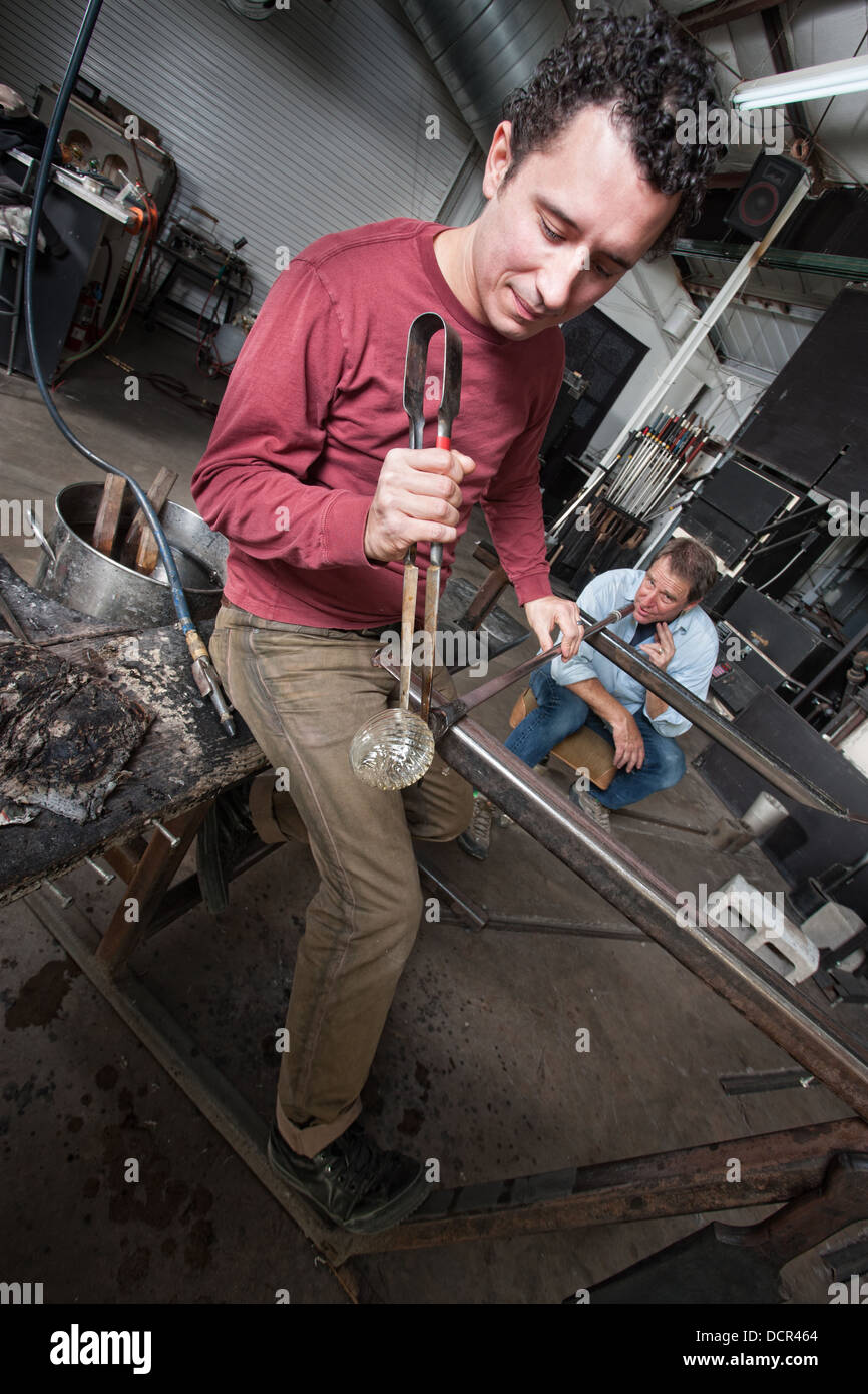 Two Men Working on Glass Art Stock Photo - Alamy