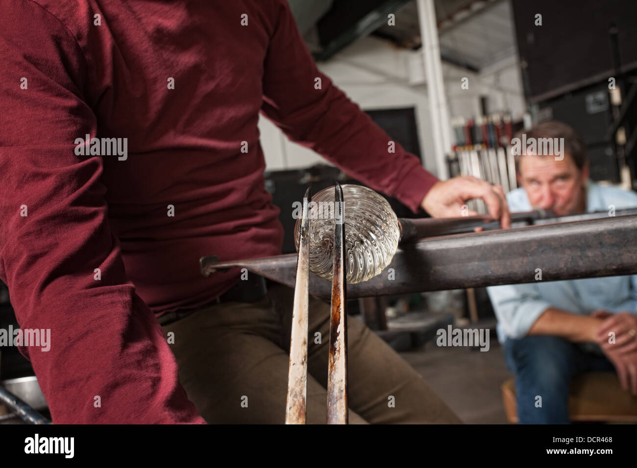 Men Creating Clear Glass Object Stock Photo - Alamy