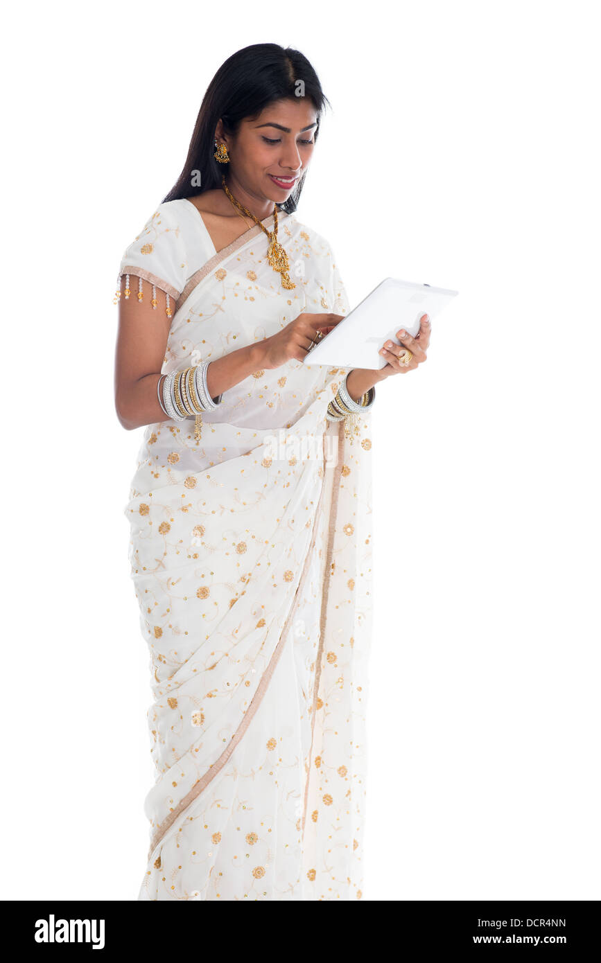 traditional indian woman in sari using tablet computer Stock Photo - Alamy